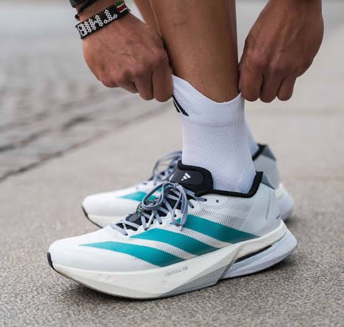 Adidas Adizero Evo SL in White and Blue - Payless AE